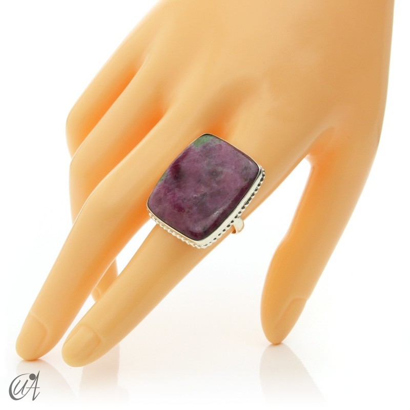 Rectangular sterling silver rings with ruby on a zoisite matrix.