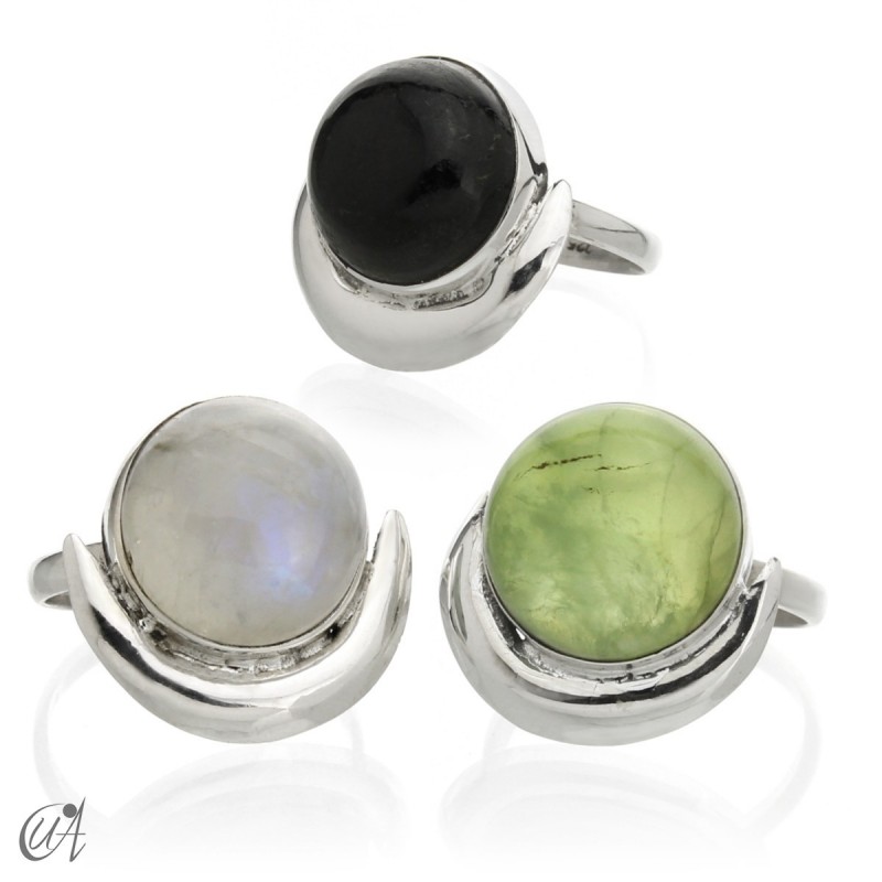 Chandra model rings in 925 silver and natural minerals.