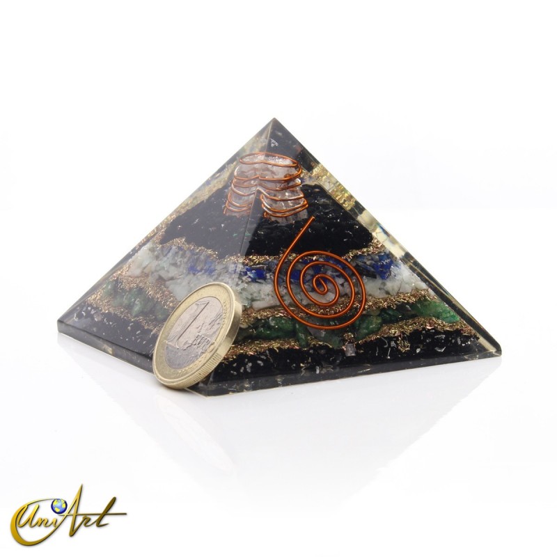 Multi-mineral orgonite pyramid with channeling quartz.